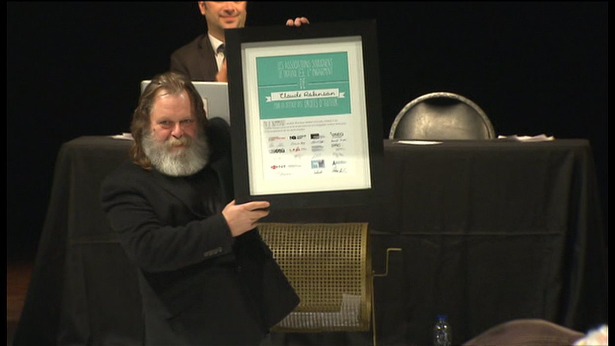 La LNI souligne l'engagement du dessinateur Claude Robinson | Radio-Canada