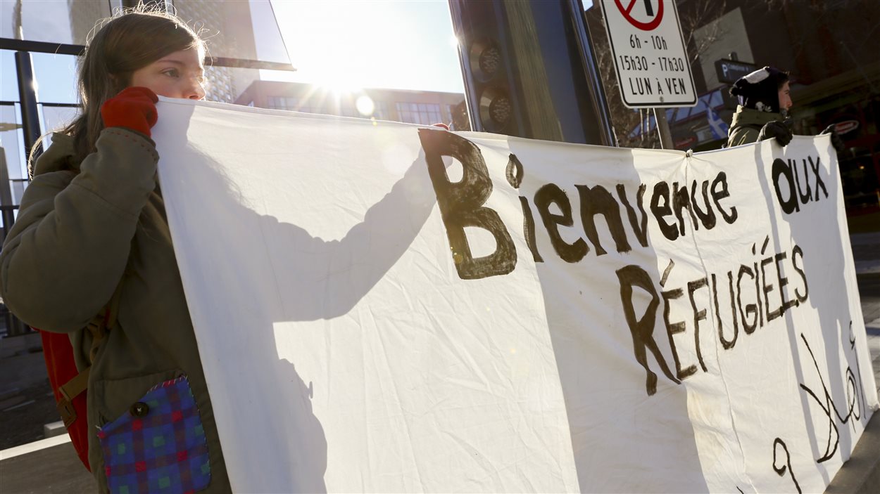 Geste d'appui à la venue de réfugiés à Québec | Radio-Canada