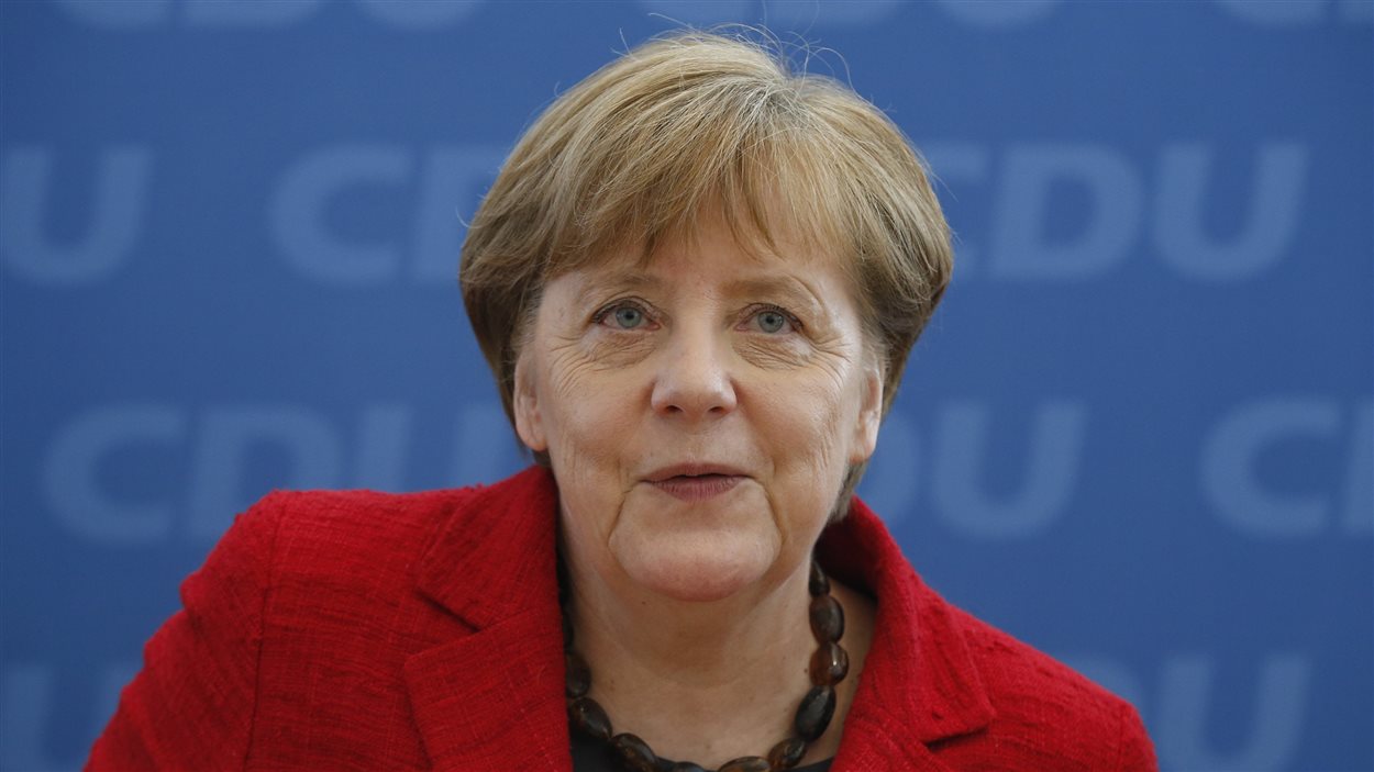 Merkel maintient sa politique d'accueil des migrants malgré un cuisant ...